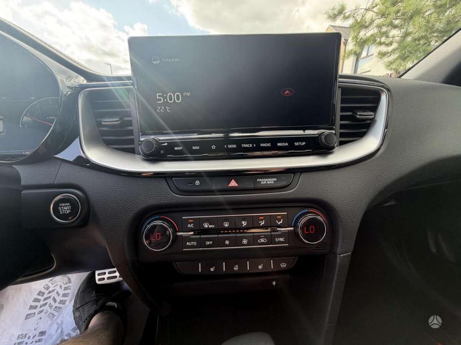 White Kia ProCeed 2021 in Vilnius, with an engine capacity of 1.59 L and mileage of 127 thousand km for 15500 €, photo 25 on AUTOMOTO.COM.LV