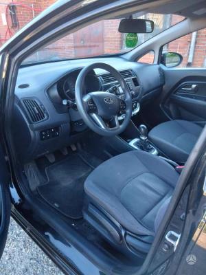 Black Kia Rio 2012 in Kaunas, with an engine capacity of 1.10 L and mileage of 230 thousand km for 3300 €, photo 8 on AUTOMOTO.COM.LV