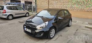 Black Kia Rio 2014 in Riga, with an engine capacity of 1.20 L and mileage of 380 thousand km for 7550 €, photo 2 on AUTOMOTO.COM.LV