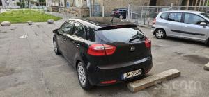 Black Kia Rio 2014 in Riga, with an engine capacity of 1.20 L and mileage of 380 thousand km for 7550 €, photo 3 on AUTOMOTO.COM.LV