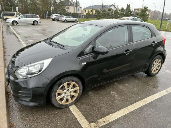 Black Kia Rio 2015 in Siauliai, with an engine capacity of 1.12 L and mileage of 220 thousand km for 3450 €, photo 5 on AUTOMOTO.COM.LV