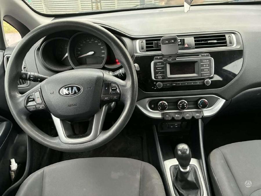 Black Kia Rio 2015 in Siauliai, with an engine capacity of 1.12 L and mileage of 220 thousand km for 3450 €, photo 9 on AUTOMOTO.COM.LV
