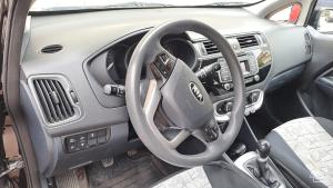 Black Kia Rio 2016 in Kaunas, with an engine capacity of 1.20 L and mileage of 148 thousand km for 4900 €, photo 7 on AUTOMOTO.COM.LV