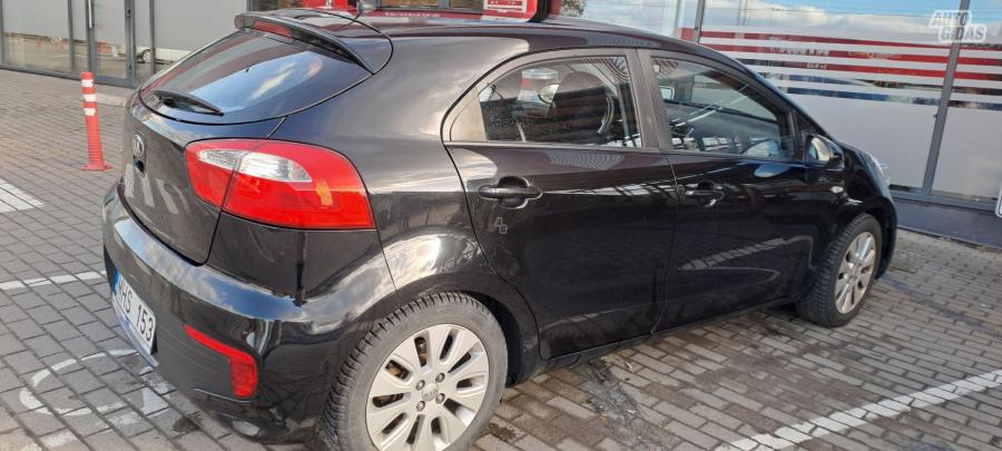 Black Kia Rio 2016 in Kaunas, with an engine capacity of 1.20 L and mileage of 148 thousand km for 4900 €, photo 10 on AUTOMOTO.COM.LV