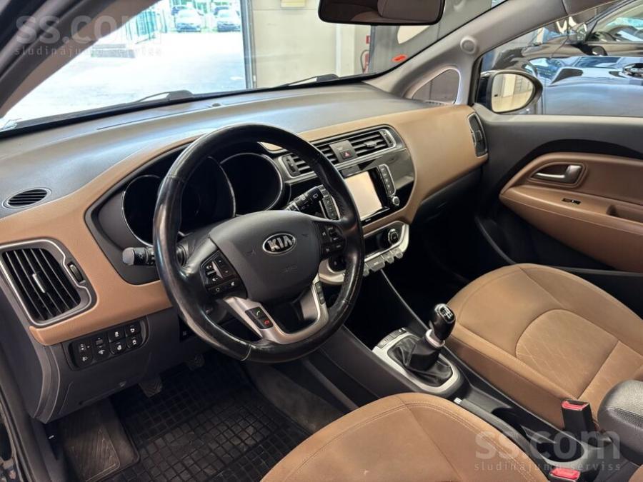 Black Kia Rio 2017 in Riga, with an engine capacity of 1.40 L and mileage of 134 thousand km for 7500 €, photo 11 on AUTOMOTO.COM.LV