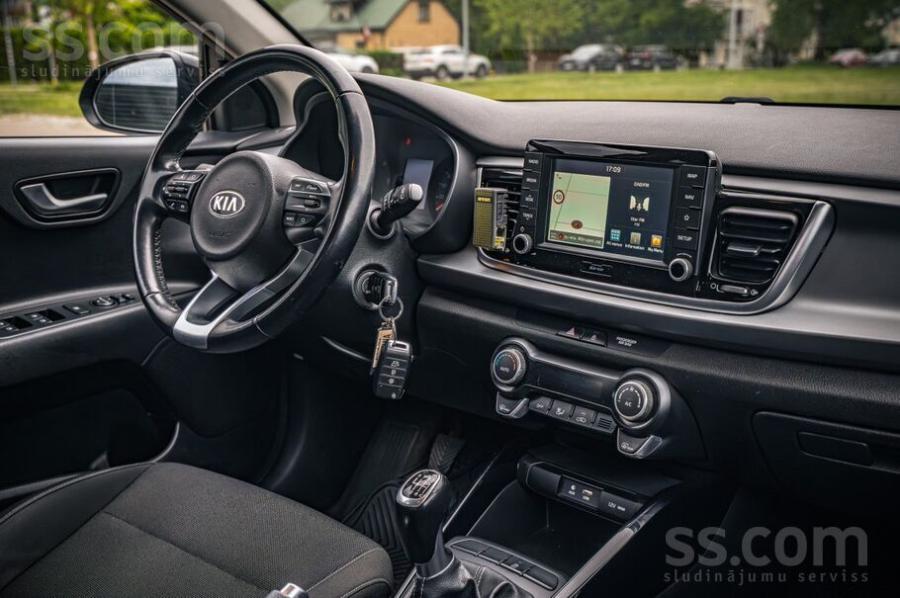 Black Kia Rio 2017 in Riga, with an engine capacity of 1.40 L and mileage of 0 thousand km for 5990 €, photo 8 on AUTOMOTO.COM.LV