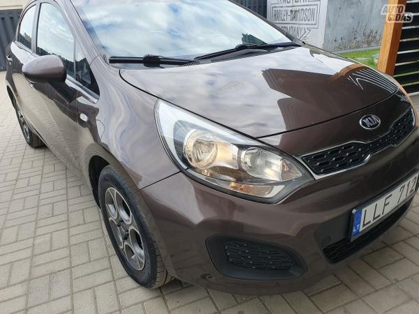Brown Kia Rio 2012 in Siauliai, with an engine capacity of 1.20 L and mileage of 276 thousand km for 2800 €, photo 1 on AUTOMOTO.COM.LV