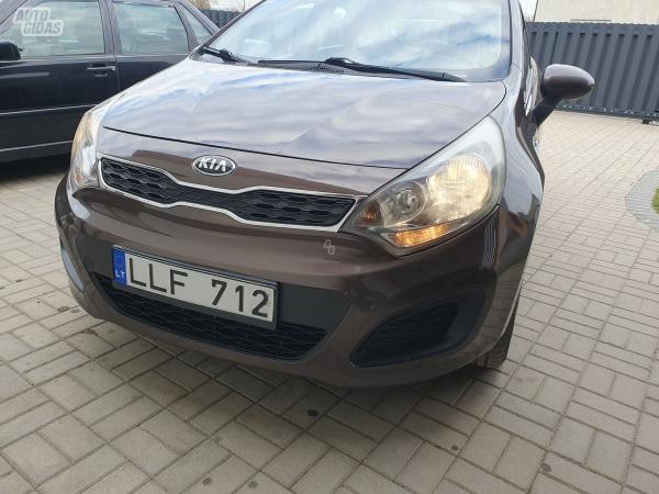 Brown Kia Rio 2012 in Siauliai, with an engine capacity of 1.20 L and mileage of 276 thousand km for 2800 €, photo 4 on AUTOMOTO.COM.LV