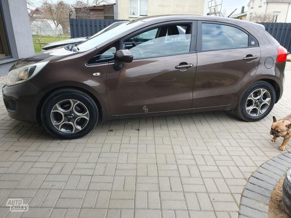 Brown Kia Rio 2012 in Siauliai, with an engine capacity of 1.20 L and mileage of 276 thousand km for 2800 €, photo 7 on AUTOMOTO.COM.LV