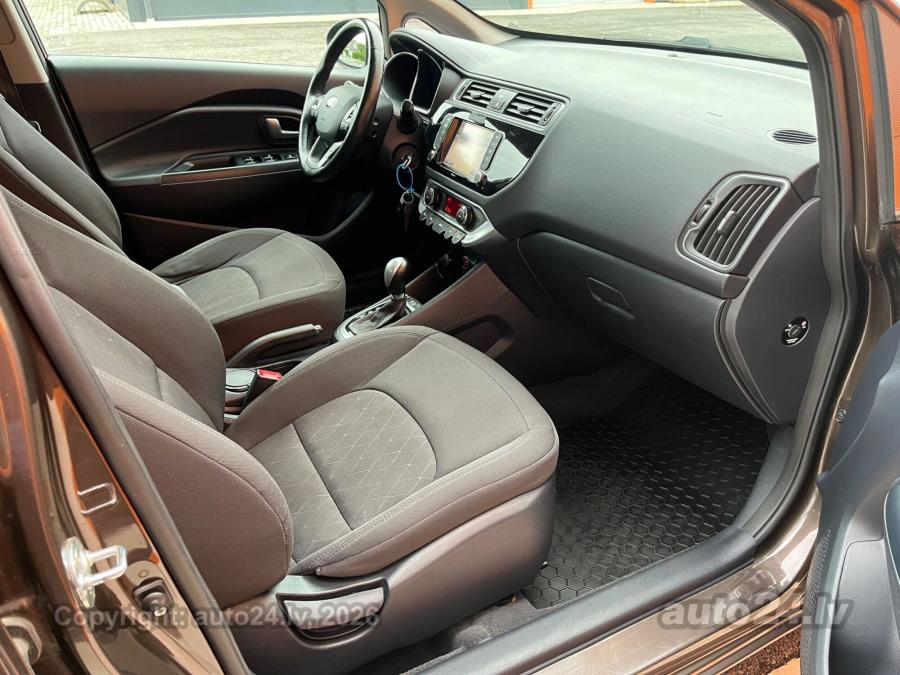 Brown Kia Rio 2015 in Kuressaare, with an engine capacity of 1.40 L and mileage of 57 thousand km for 8890 €, photo 12 on AUTOMOTO.COM.LV