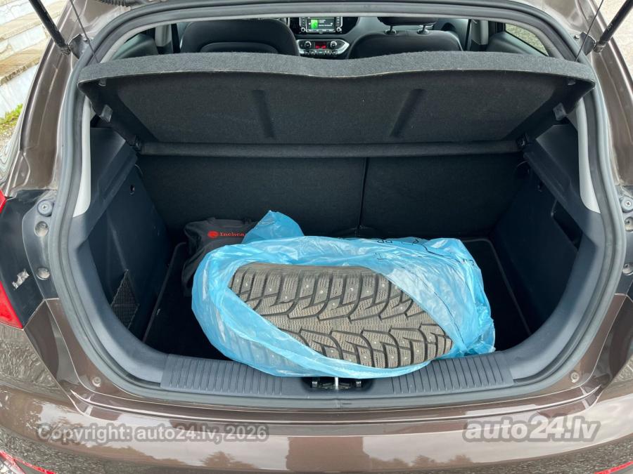 Brown Kia Rio 2015 in Kuressaare, with an engine capacity of 1.40 L and mileage of 57 thousand km for 8890 €, photo 15 on AUTOMOTO.COM.LV