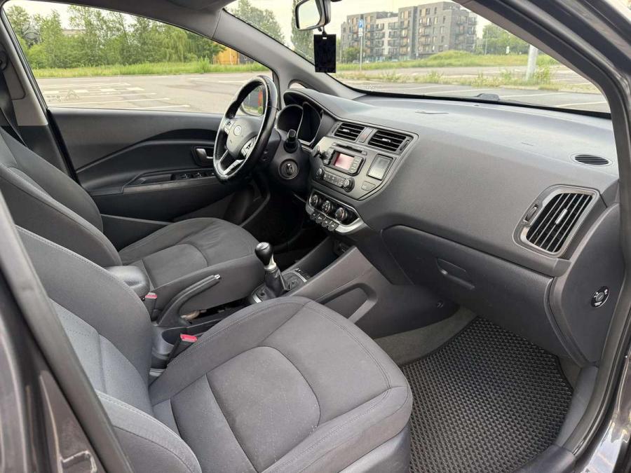 Grey Kia Rio 2013 in Vilnius, with an engine capacity of 1.25 L and mileage of 114 thousand km for 3600 €, photo 16 on AUTOMOTO.COM.LV