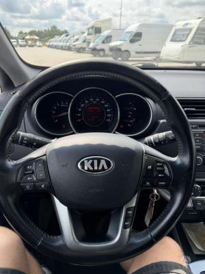 Grey Kia Rio 2014 in Taurage, with an engine capacity of 1.12 L and mileage of 216 thousand km for 2700 €, photo 9 on AUTOMOTO.COM.LV