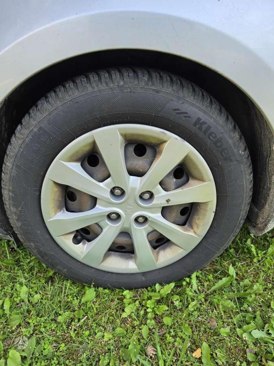 Grey Kia Rio 2014 in Kaunas, with an engine capacity of 1.12 L and mileage of 195 thousand km for 2900 €, photo 6 on AUTOMOTO.COM.LV