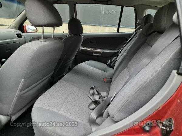 Red Kia Rio 2004 in Tallinn, with an engine capacity of 1.50 L and mileage of 190 thousand km for 999 €, photo 11 on AUTOMOTO.COM.LV