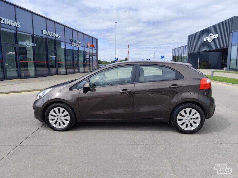 Red Kia Rio 2012 in Siauliai, with an engine capacity of 1.10 L and mileage of 270 thousand km for 4150 €, photo 9 on AUTOMOTO.COM.LV
