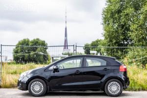 White Kia Rio 2014 in Riga, with an engine capacity of 1.20 L and mileage of 293 thousand km for 2990 €, photo 6 on AUTOMOTO.COM.LV