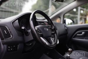 White Kia Rio 2014 in Riga, with an engine capacity of 1.20 L and mileage of 293 thousand km for 2990 €, photo 13 on AUTOMOTO.COM.LV
