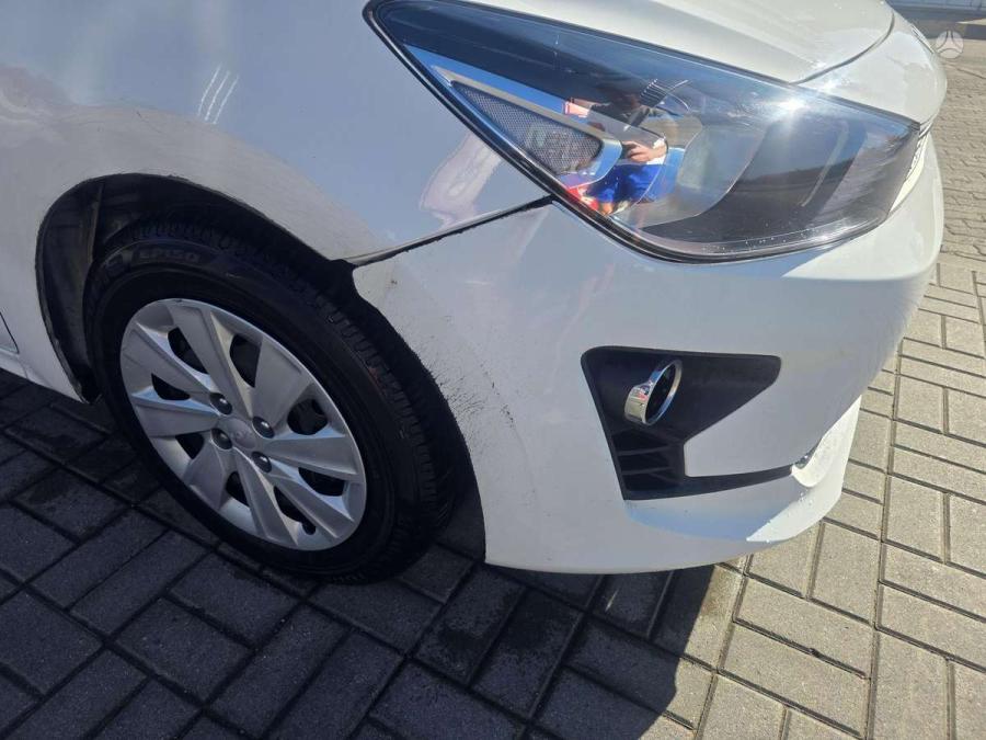 White Kia Rio 2021 in Taurage, with an engine capacity of 1.20 L and mileage of 80 thousand km for 8000 €, photo 14 on AUTOMOTO.COM.LV