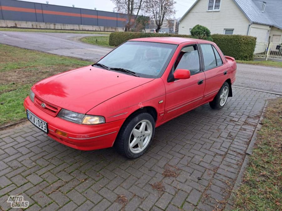 Red Kia Sephia 1994 in Panevezys, with an engine capacity of 1.60 L and mileage of 143 thousand km for 750 €, photo 5 on AUTOMOTO.COM.LV