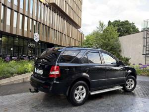 Black Kia Sorento 2005 in Vilnius, with an engine capacity of 2.40 L and mileage of 180 thousand km for 2450 €, photo 5 on AUTOMOTO.COM.LV