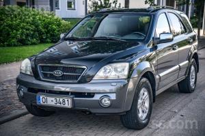 Black Kia Sorento 2005 in Riga, with an engine capacity of 2.50 L and mileage of 215 thousand km for 2990 €, photo  on AUTOMOTO.COM.LV