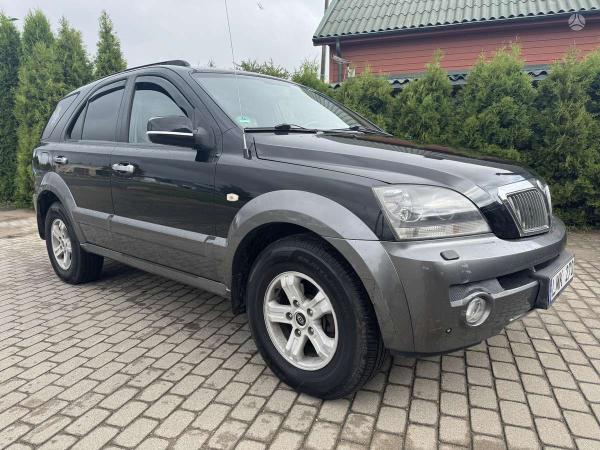 Melns Kia Sorento 2006 Kretinga, ar dzinēja tilpumu 2.50 L un nobraukumu 295 tūkst. km par 2495 €, foto 1 vietnē AUTOMOTO.COM.LV