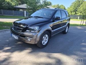 Black Kia Sorento 2006 in Riga, with an engine capacity of 2.50 L and mileage of 187 thousand km for 1900 €, photo  on AUTOMOTO.COM.LV