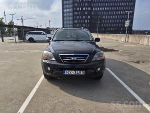 Black Kia Sorento 2006 in Riga, with an engine capacity of 2.50 L and mileage of 330 thousand km for 4600 €, photo  on AUTOMOTO.COM.LV
