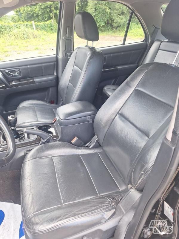 Black Kia Sorento 2007 in Prienai, with an engine capacity of 2.50 L and mileage of 253 thousand km for 2750 €, photo 6 on AUTOMOTO.COM.LV