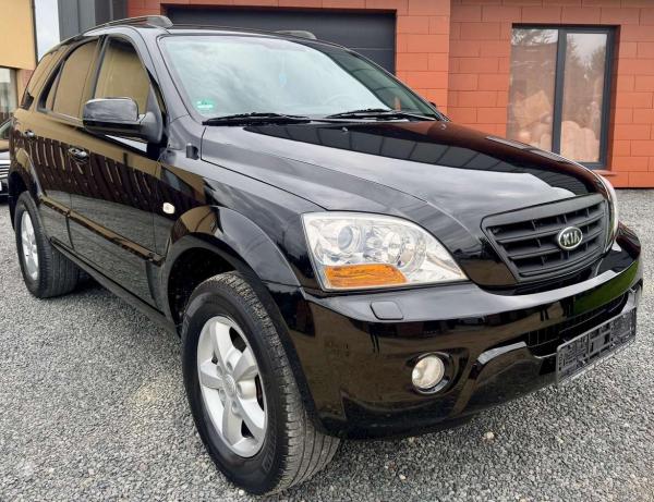Black Kia Sorento 2007 in Marijampole, with an engine capacity of 2.50 L and mileage of 242 thousand km for 4200 €, photo 4 on AUTOMOTO.COM.LV