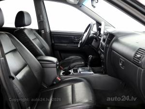Black Kia Sorento 2007 in Tallinn, with an engine capacity of 2.50 L and mileage of 238 thousand km for 2199 €, photo 7 on AUTOMOTO.COM.LV