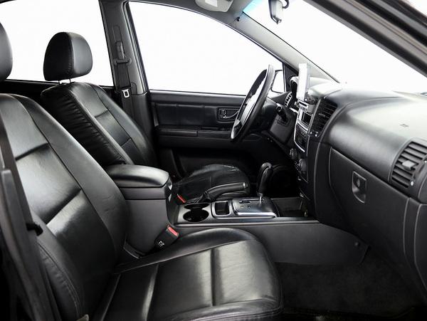 Black Kia Sorento 2007 in Tallinn, with an engine capacity of 2.50 L and mileage of 238 thousand km for 2199 €, photo 6 on AUTOMOTO.COM.LV