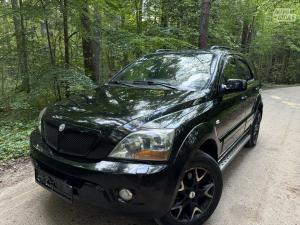 Black Kia Sorento 2007 in Prienai, with an engine capacity of 2.50 L and mileage of 365 thousand km for 3200 €, photo  on AUTOMOTO.COM.LV