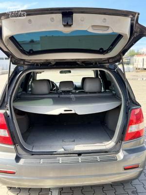 Black Kia Sorento 2007 in Kaunas, with an engine capacity of 2.50 L and mileage of 240 thousand km for 2150 €, photo 14 on AUTOMOTO.COM.LV