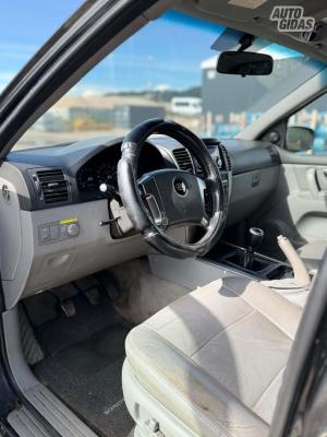 Black Kia Sorento 2007 in Kaunas, with an engine capacity of 2.50 L and mileage of 240 thousand km for 2150 €, photo 16 on AUTOMOTO.COM.LV
