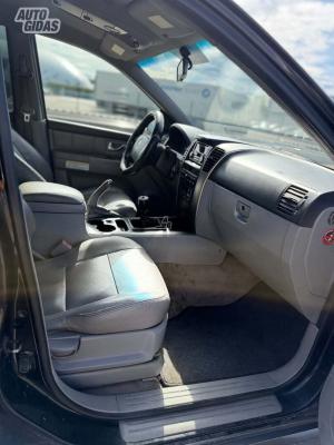 Black Kia Sorento 2007 in Kaunas, with an engine capacity of 2.50 L and mileage of 240 thousand km for 2150 €, photo 18 on AUTOMOTO.COM.LV