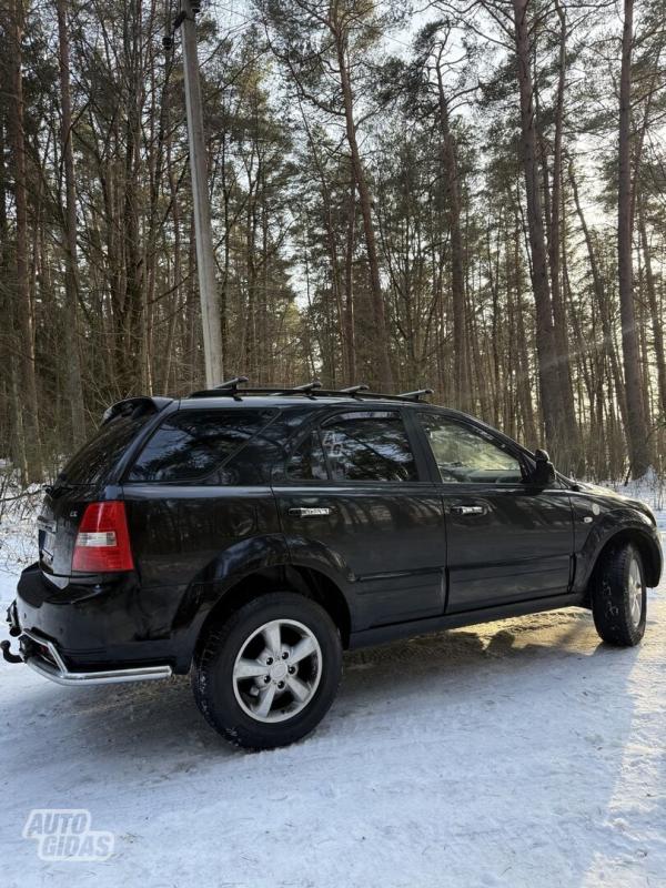 Black Kia Sorento 2008 in Prienai, with an engine capacity of 2.50 L and mileage of 239 thousand km for 3650 €, photo 10 on AUTOMOTO.COM.LV