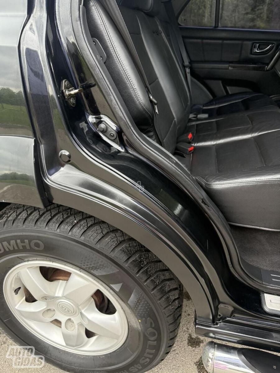 Melns Kia Sorento 2008 Prienai, ar dzinēja tilpumu 2.50 L un nobraukumu 292 tūkst. km par 3800 €, foto 22 vietnē AUTOMOTO.COM.LV