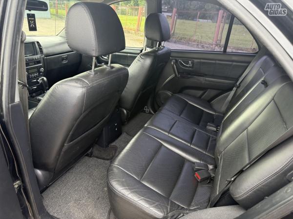 Black Kia Sorento 2008 in Prienai, with an engine capacity of 2.50 L and mileage of 211 thousand km for 3500 €, photo 10 on AUTOMOTO.COM.LV