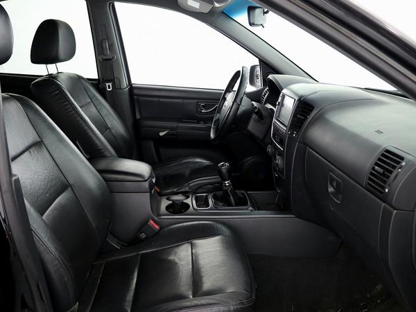 Black Kia Sorento 2008 in Tallinn, with an engine capacity of 2.50 L and mileage of 238 thousand km for 899 €, photo 6 on AUTOMOTO.COM.LV