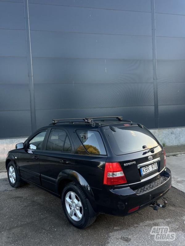 Black Kia Sorento 2008 in Klaipeda, with an engine capacity of 2.50 L and mileage of 313 thousand km for 2500 €, photo 3 on AUTOMOTO.COM.LV