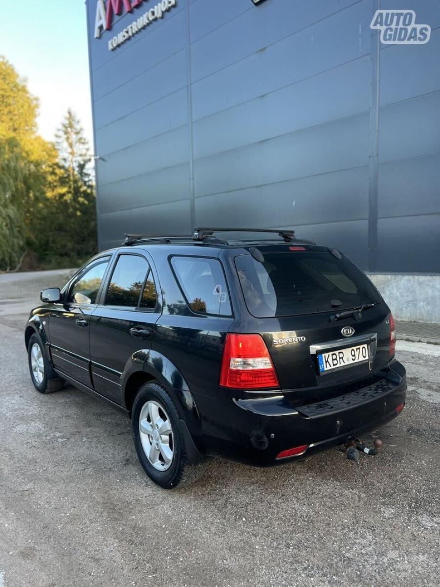 Black Kia Sorento 2008 in Klaipeda, with an engine capacity of 2.50 L and mileage of 313 thousand km for 2500 €, photo 7 on AUTOMOTO.COM.LV