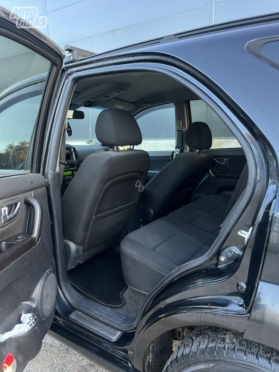 Black Kia Sorento 2008 in Klaipeda, with an engine capacity of 2.50 L and mileage of 313 thousand km for 2500 €, photo 8 on AUTOMOTO.COM.LV