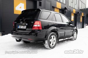 Black Kia Sorento 2009 in Tallinn, with an engine capacity of 2.50 L and mileage of 231 thousand km for 4599 €, photo 4 on AUTOMOTO.COM.LV