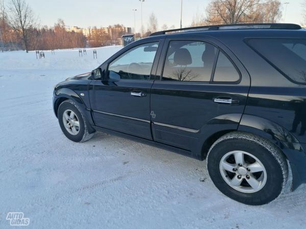 Melns Kia Sorento 2009 Utena, ar dzinēja tilpumu 2.50 L un nobraukumu 169 tūkst. km par 2950 €, foto 7 vietnē AUTOMOTO.COM.LV