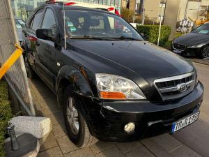 Black Kia Sorento 2009 in Marijampole, with an engine capacity of 2.50 L and mileage of 260 thousand km for 1599 €, photo  on AUTOMOTO.COM.LV