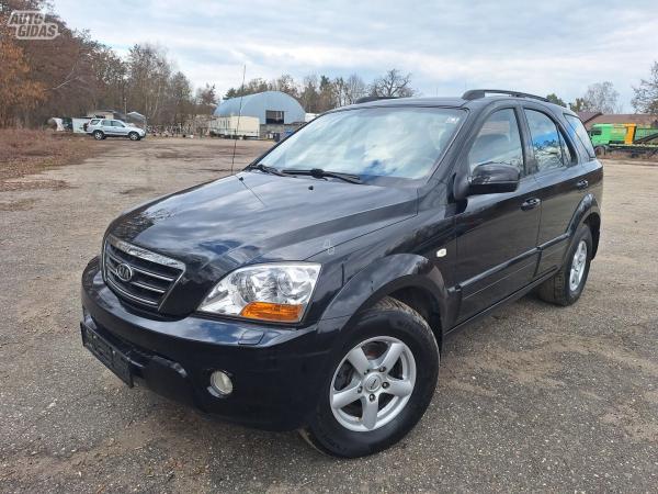 Black Kia Sorento 2009 in Prienai, with an engine capacity of 2.50 L and mileage of 247 thousand km for 2999 €, photo 1 on AUTOMOTO.COM.LV
