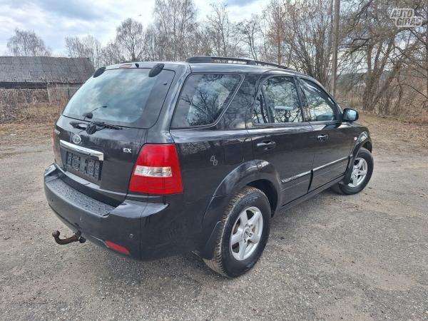 Black Kia Sorento 2009 in Prienai, with an engine capacity of 2.50 L and mileage of 247 thousand km for 2999 €, photo 4 on AUTOMOTO.COM.LV