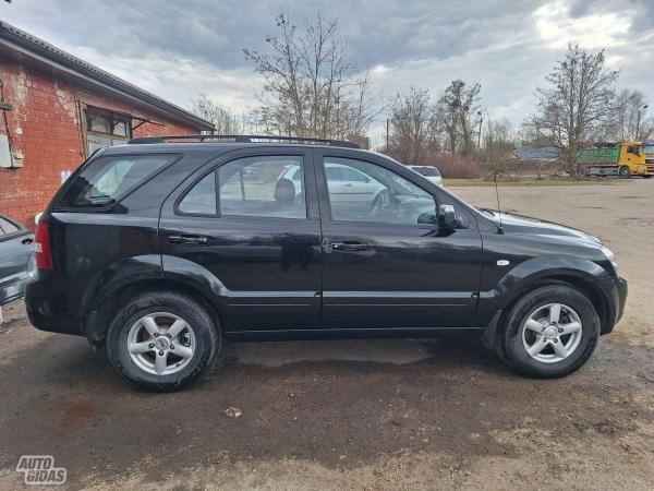 Black Kia Sorento 2009 in Prienai, with an engine capacity of 2.50 L and mileage of 247 thousand km for 2999 €, photo 10 on AUTOMOTO.COM.LV